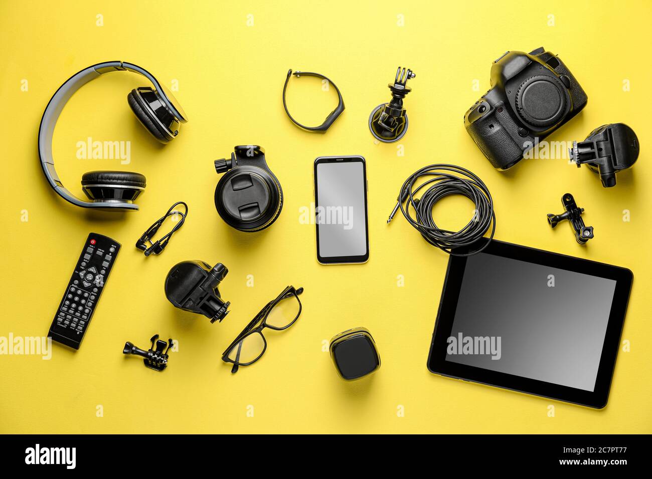 Different modern devices on color background Stock Photo - Alamy