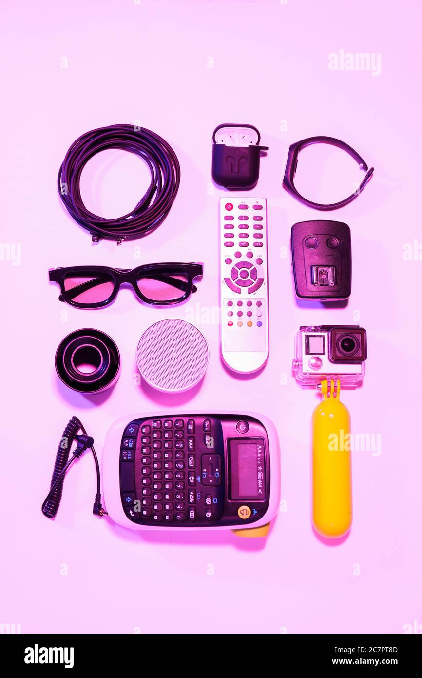 Different modern devices on color background Stock Photo - Alamy