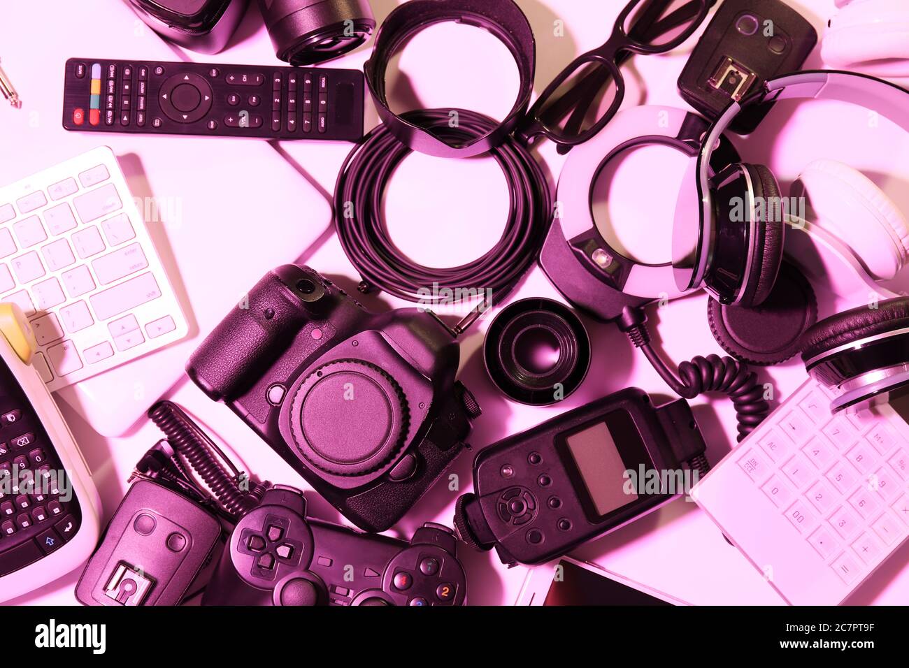 Different modern devices on color background Stock Photo - Alamy