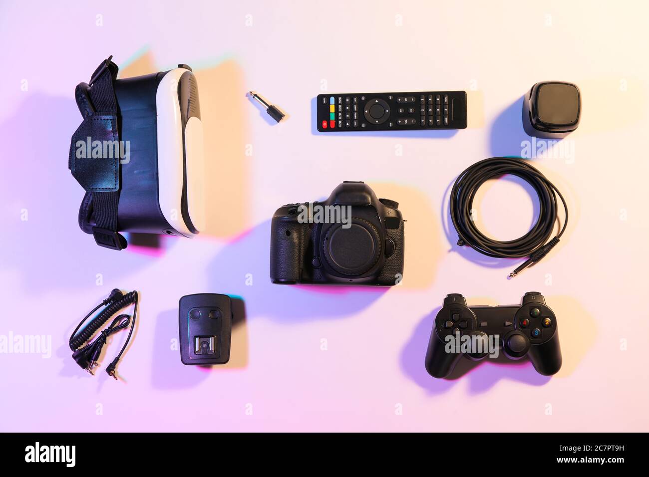 Different modern devices on color background Stock Photo - Alamy