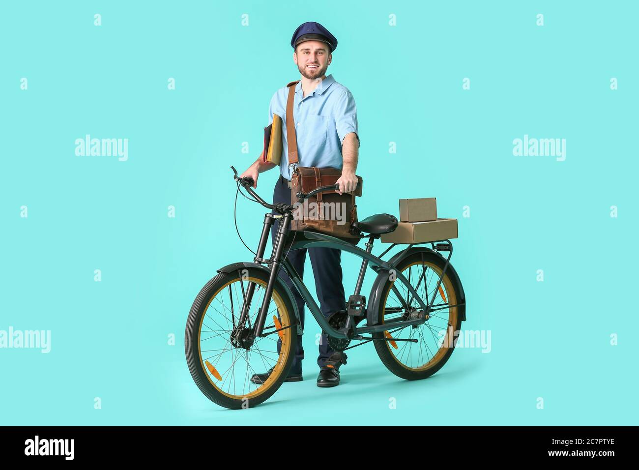 Postman with bicycle hi-res stock photography and images - Alamy