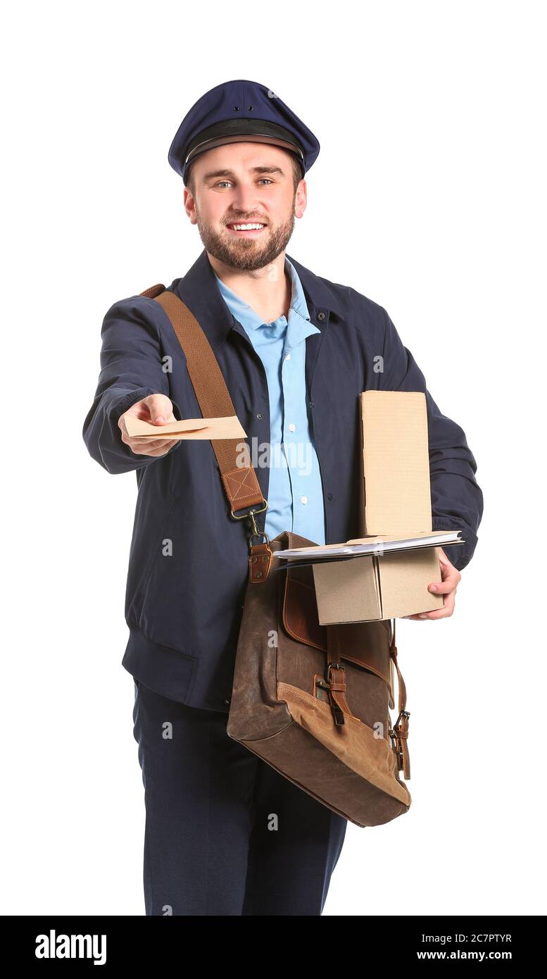 Handsome young postman on white background Stock Photo - Alamy