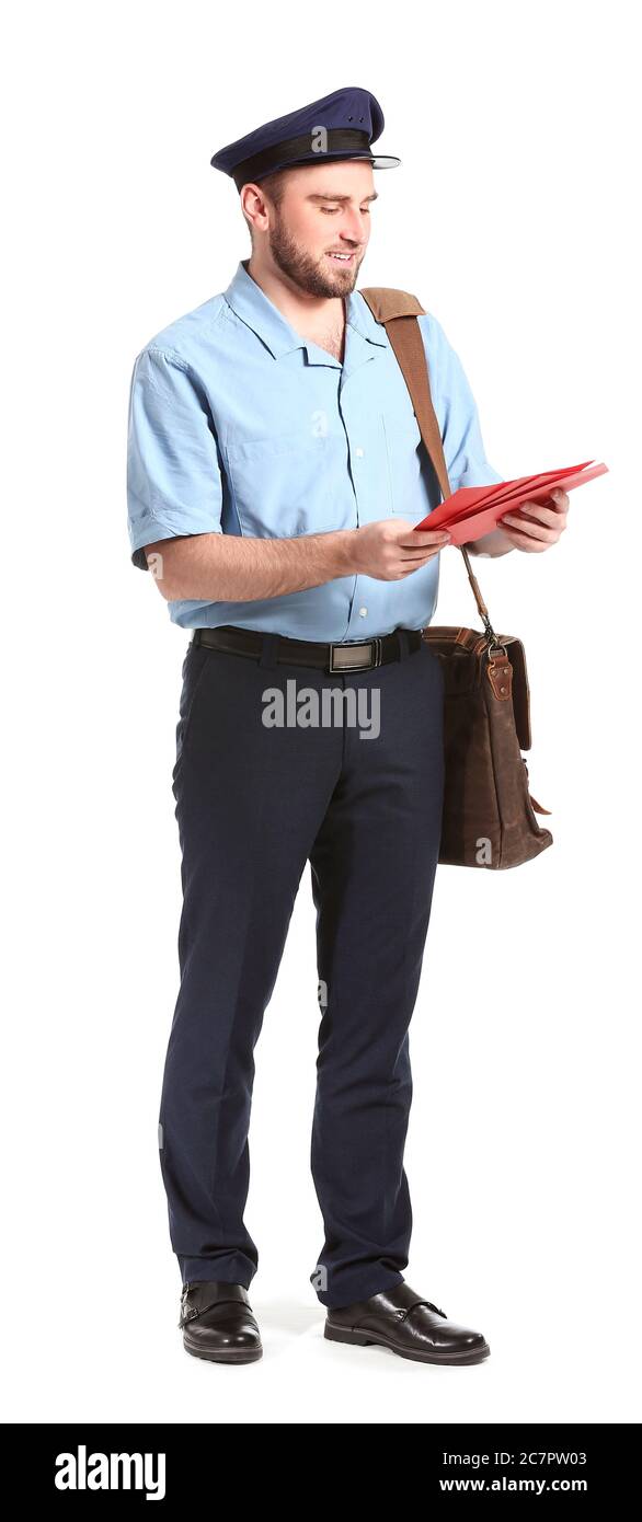 Handsome young postman on white background Stock Photo - Alamy