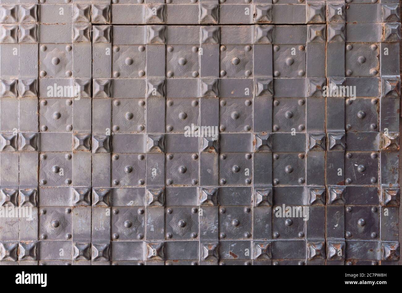 metallic background from medieval door with forged rivets Stock Photo ...