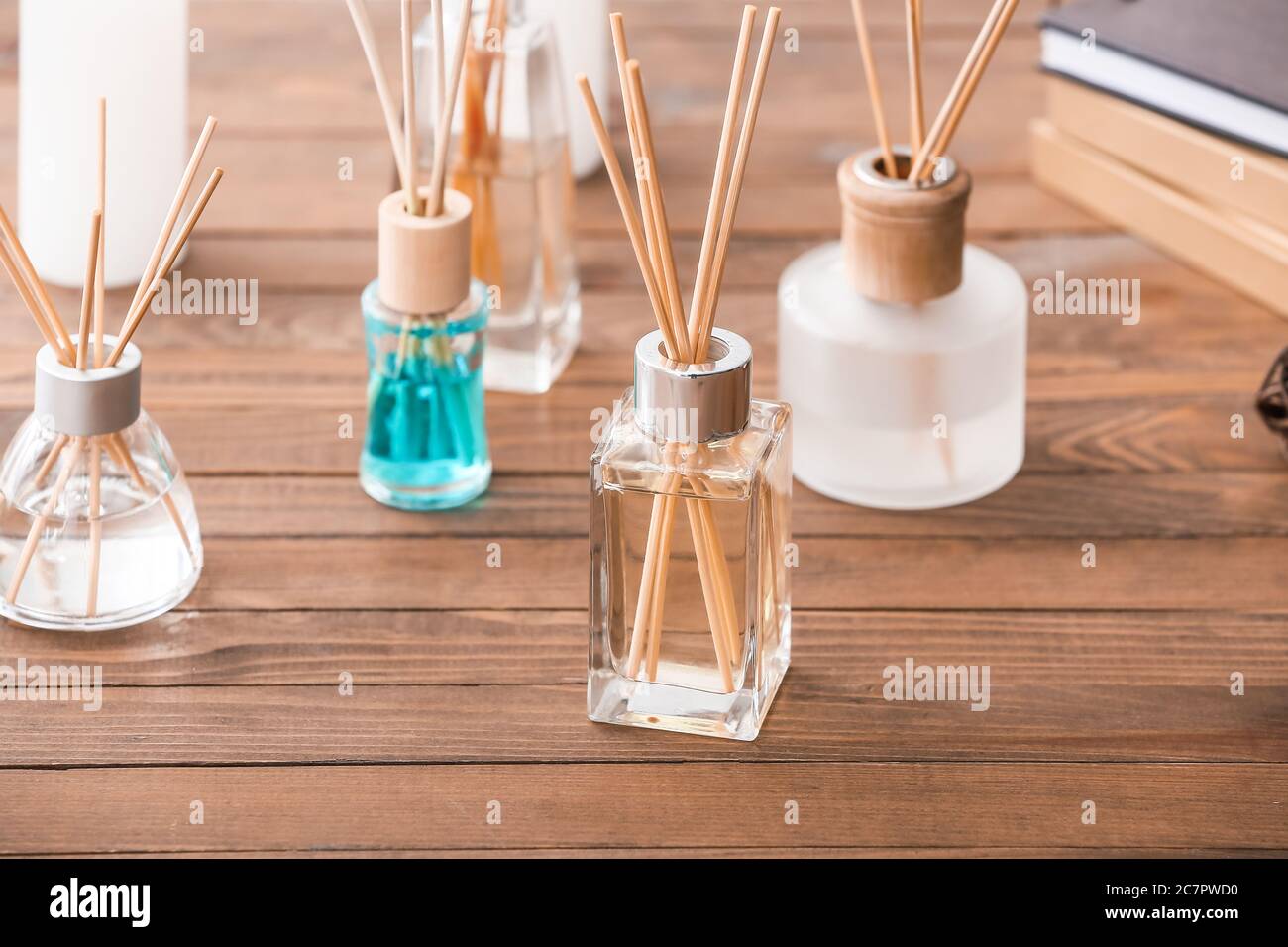 Reed diffusers on table in room Stock Photo - Alamy