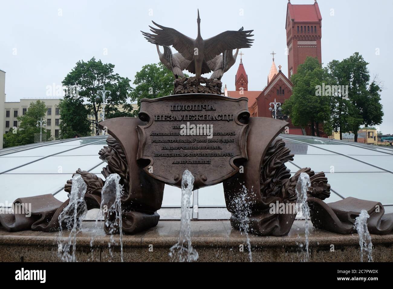 the Belarus national bird, the crane, stands in front of the Red Church ...