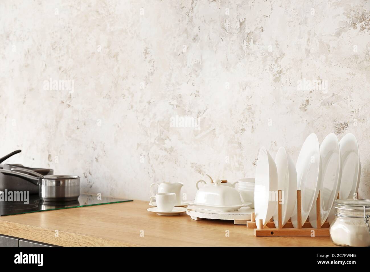 Set of utensils on kitchen counter Stock Photo - Alamy