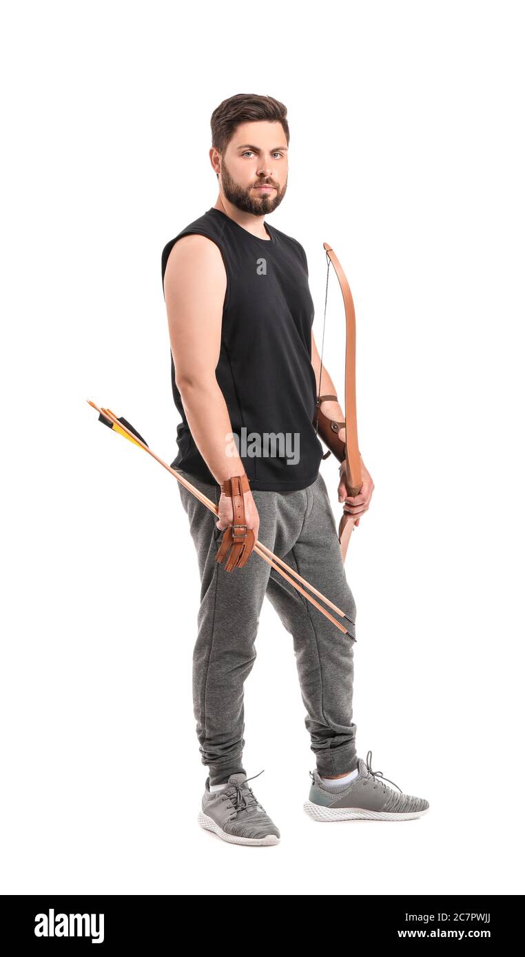 Handsome man with crossbow on white background Stock Photo - Alamy