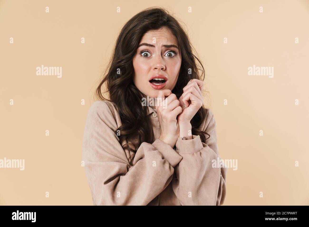 Image of scared shocked nice woman posing and looking at camera ...