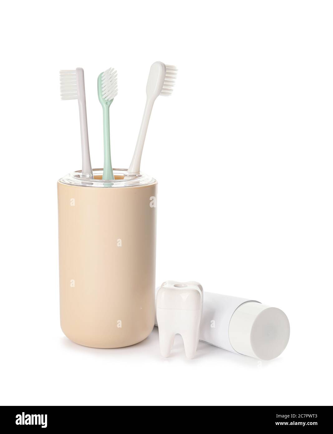 Toothbrushes and paste on white background Stock Photo - Alamy