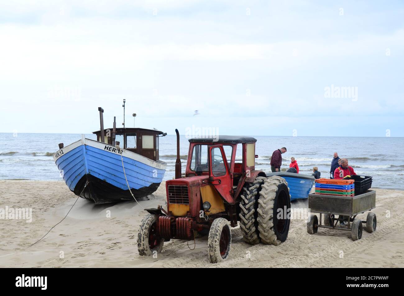 Fishing boat tractor on beach hi-res stock photography and images - Alamy
