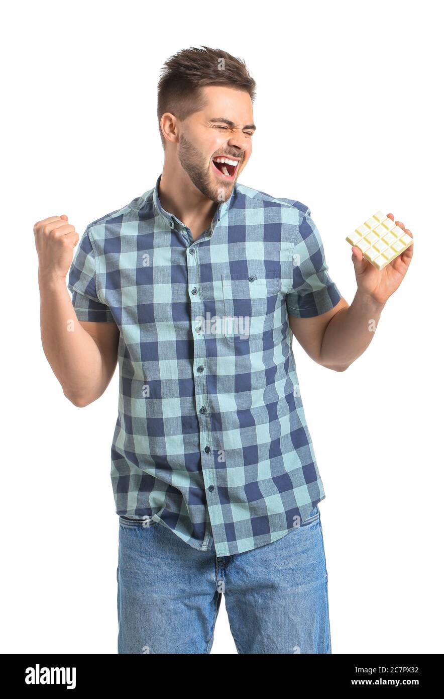 Guy eating chocolate bar and happy hi-res stock photography and images ...