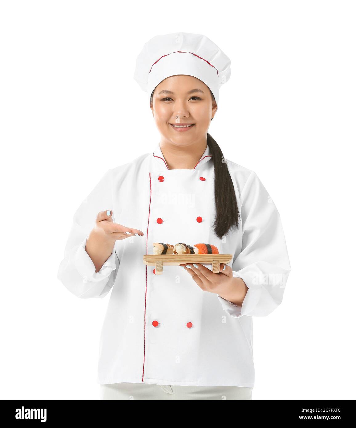 Beautiful Asian chef with sushi rolls on white background Stock Photo ...