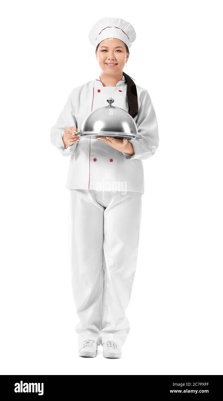 Beautiful Asian chef with tray on white background Stock Photo - Alamy