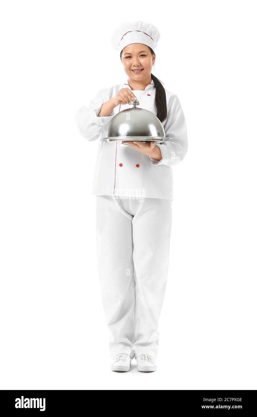 Beautiful Asian chef with tray on white background Stock Photo - Alamy