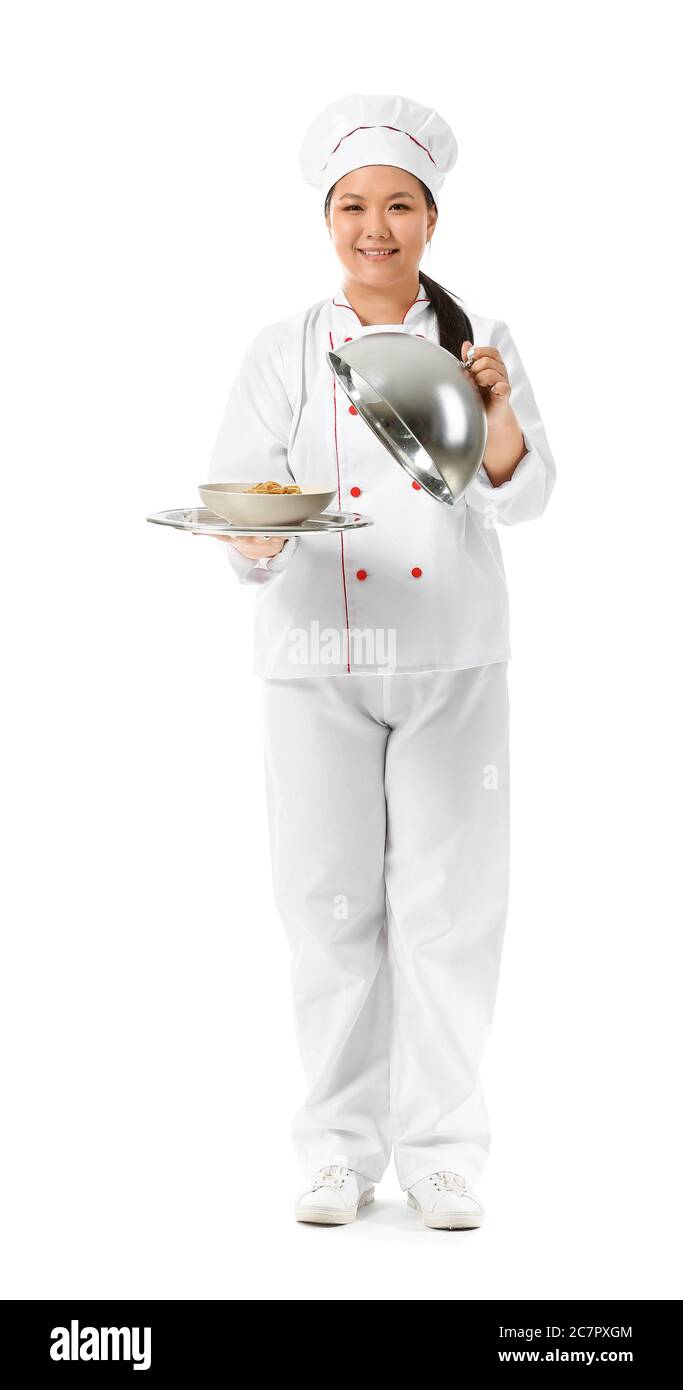 Beautiful Asian chef with dish on white background Stock Photo - Alamy