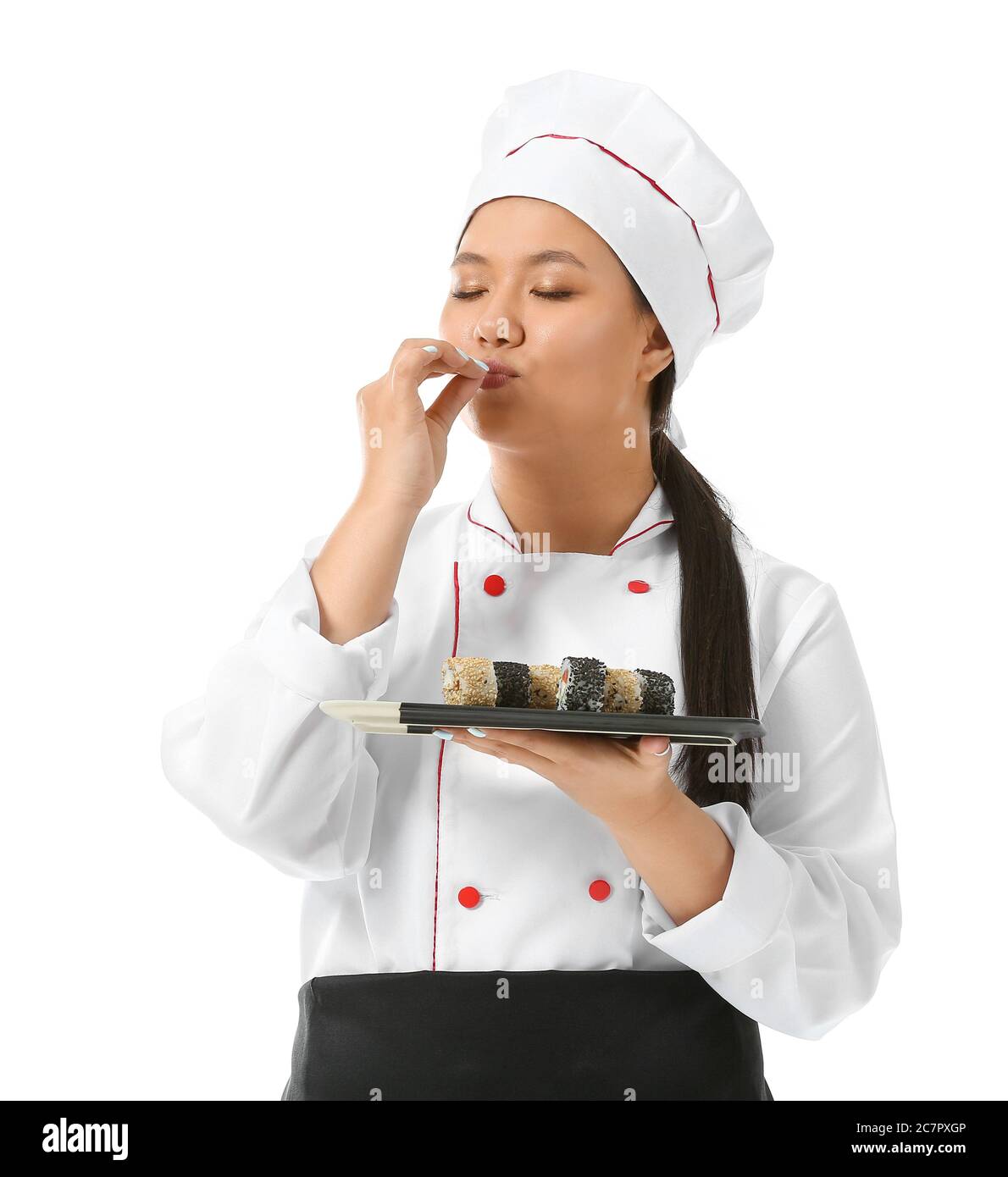 Beautiful Asian chef with sushi rolls on white background Stock Photo ...