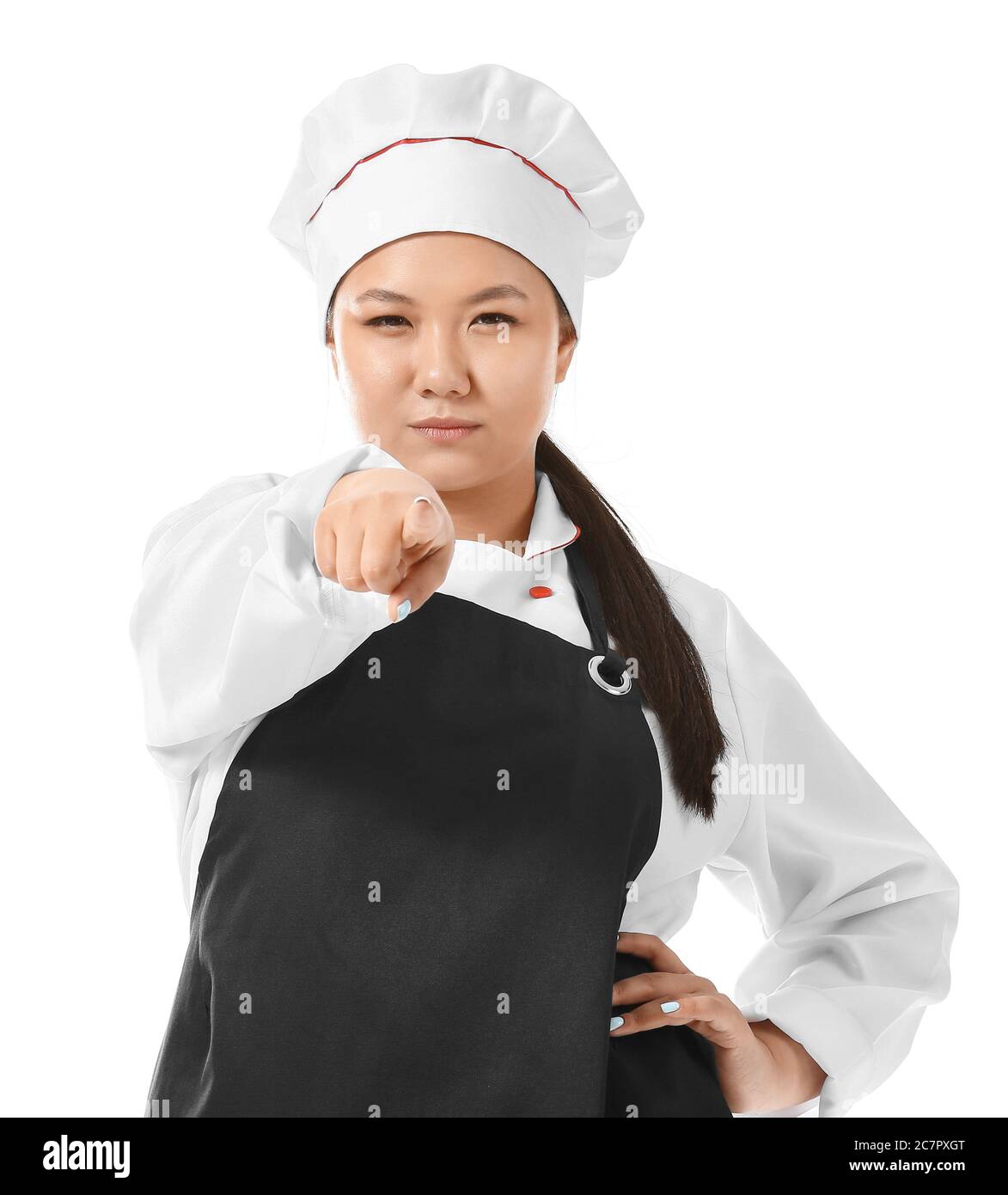 Beautiful Asian chef pointing at viewer on white background Stock Photo ...