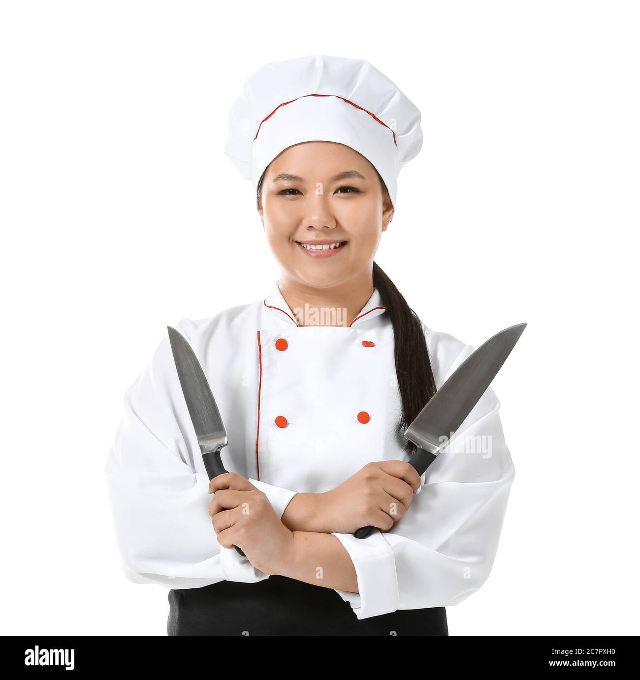 Beautiful Asian chef with knives on white background Stock Photo - Alamy