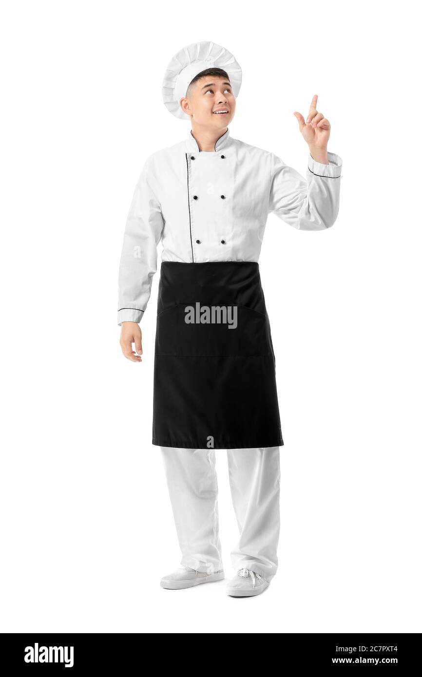 Handsome Asian chef with raised index finger on white background Stock ...