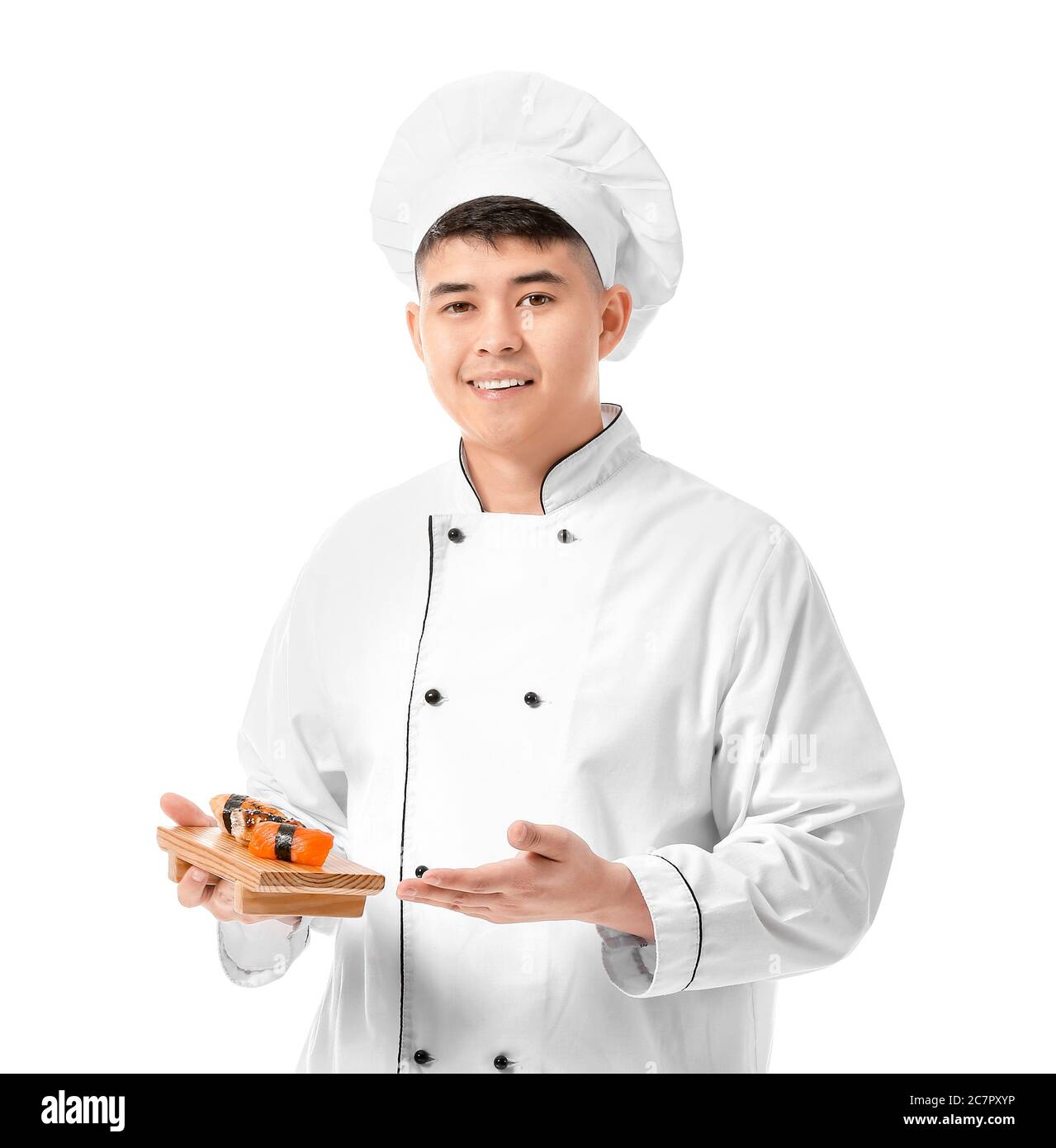 Handsome Asian chef with sushi rolls on white background Stock Photo ...