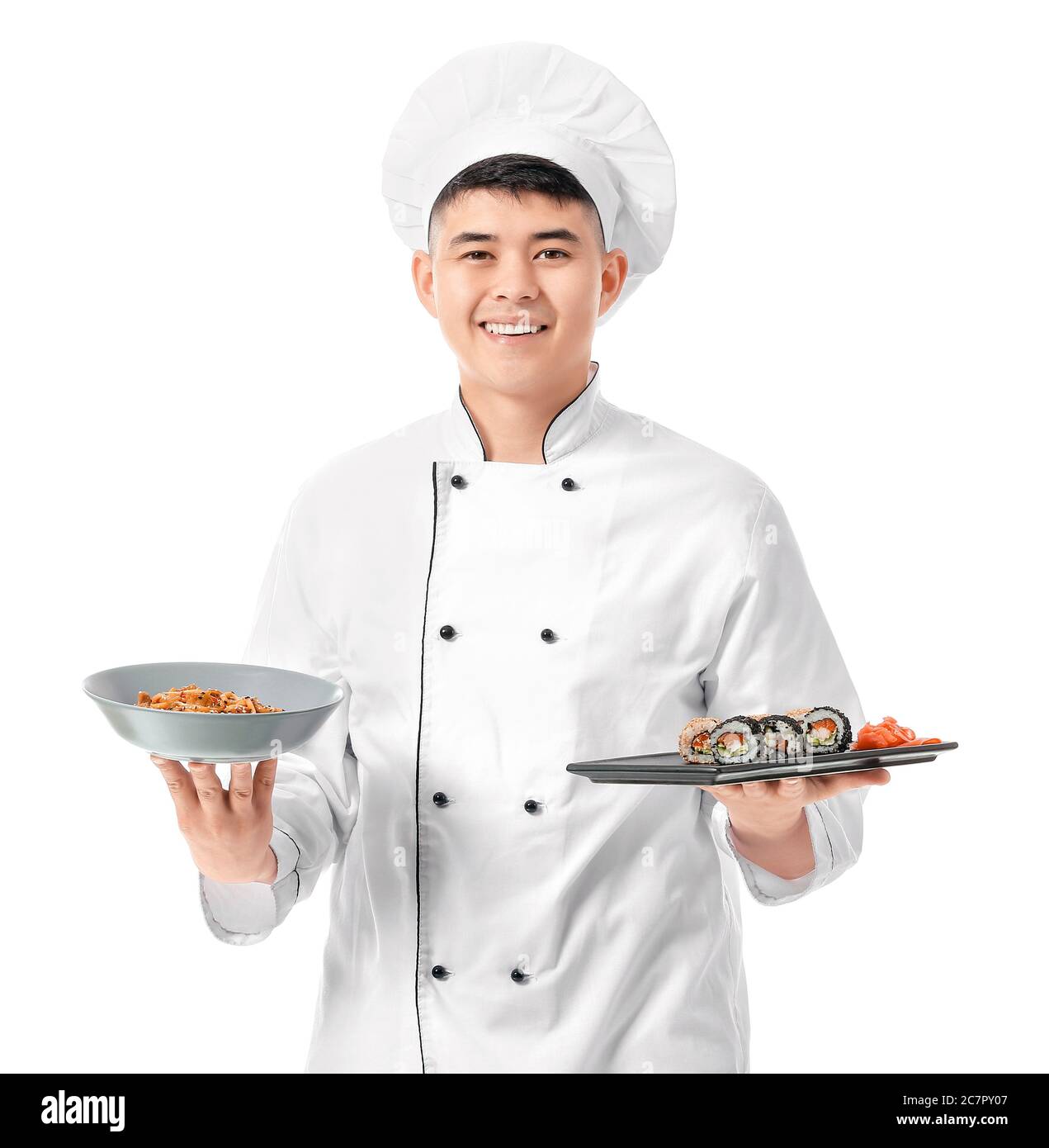 Handsome Asian chef with sushi rolls on white background Stock Photo ...