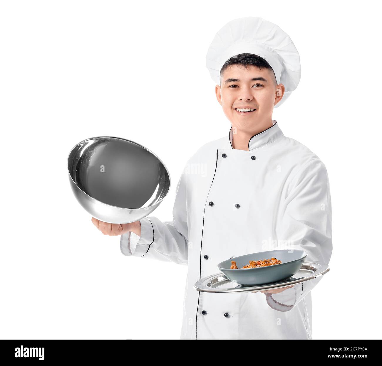Handsome Asian chef with dish on white background Stock Photo - Alamy