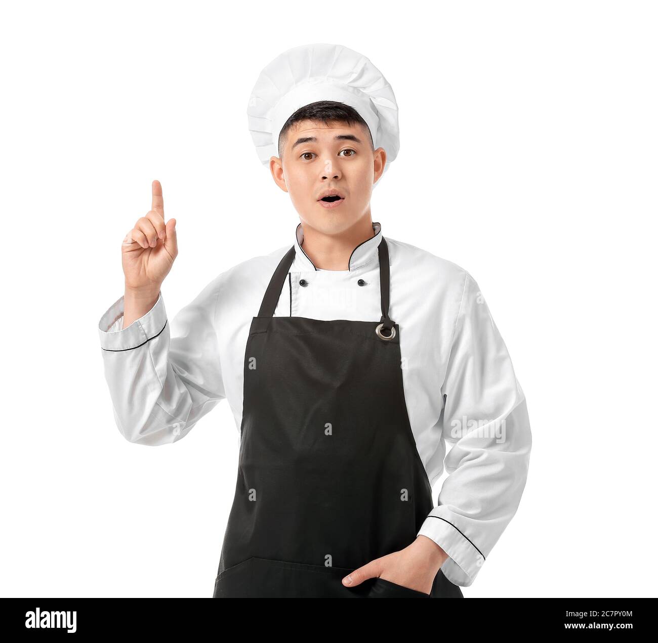 Handsome Asian chef with raised index finger on white background Stock ...