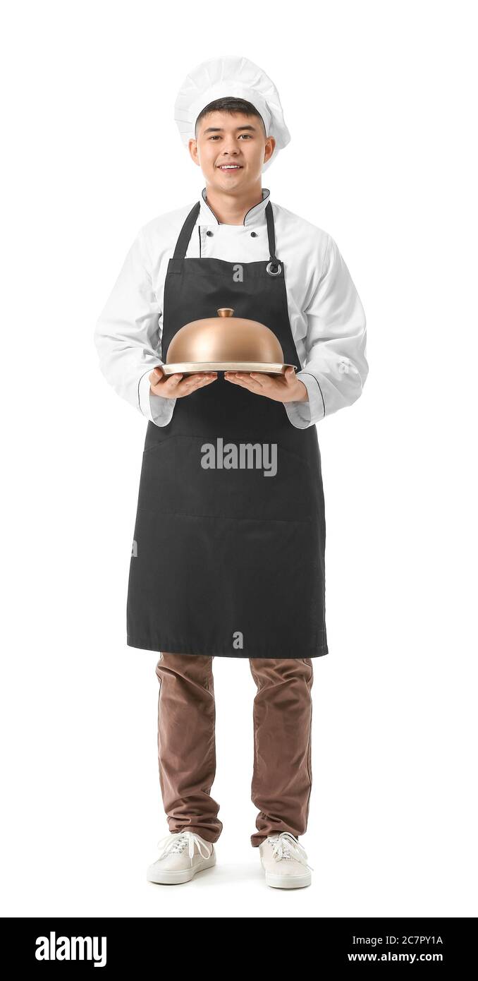 Handsome Asian chef with tray on white background Stock Photo - Alamy