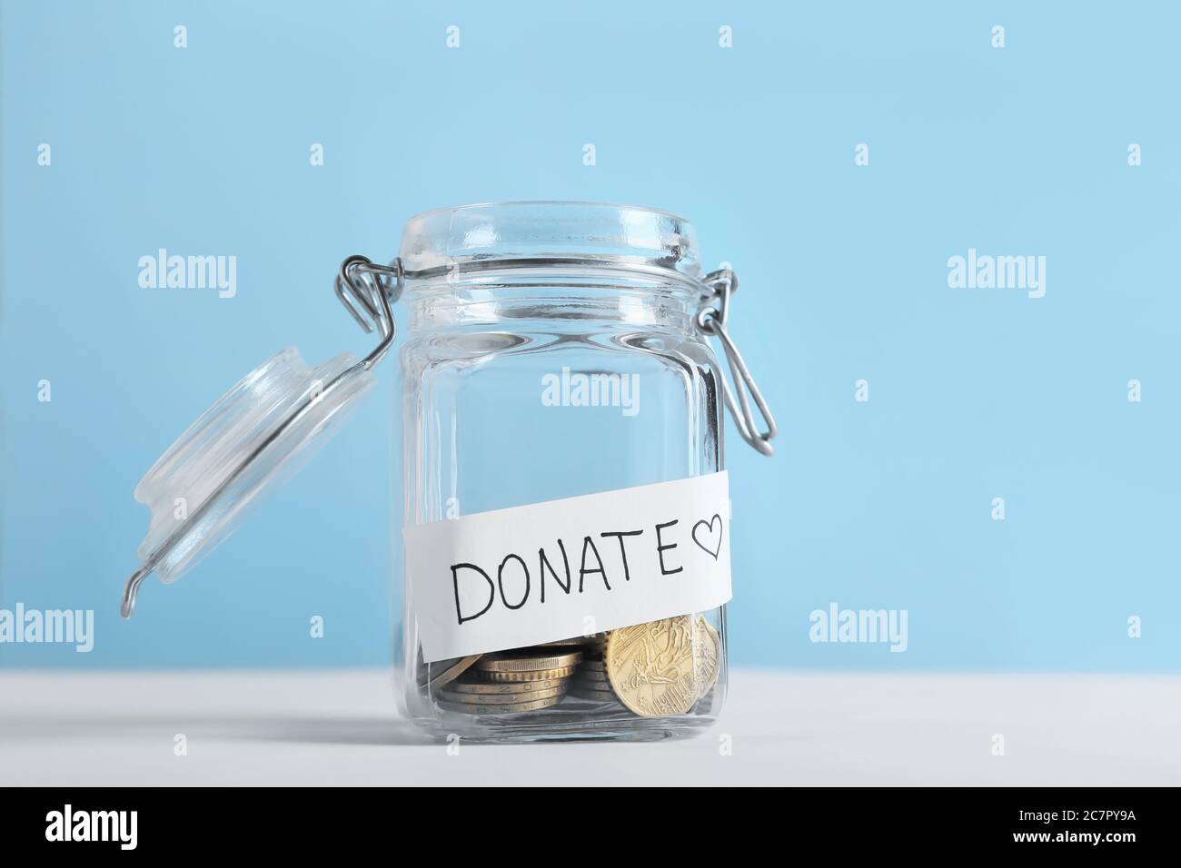 Donations jar hi-res stock photography and images - Alamy