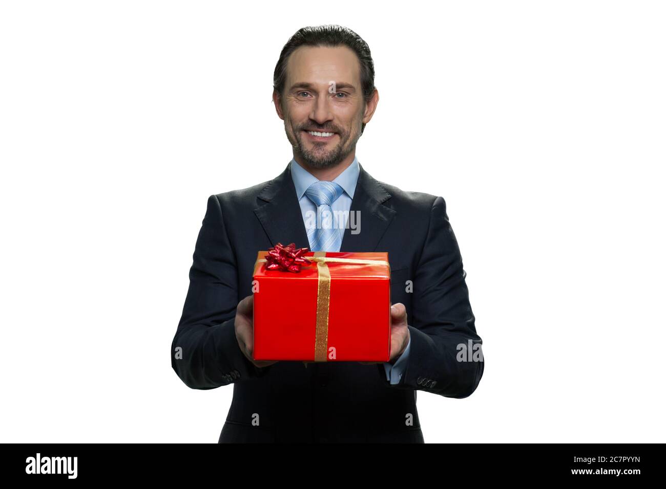 Portrait of adult man giving a gift Stock Photo - Alamy