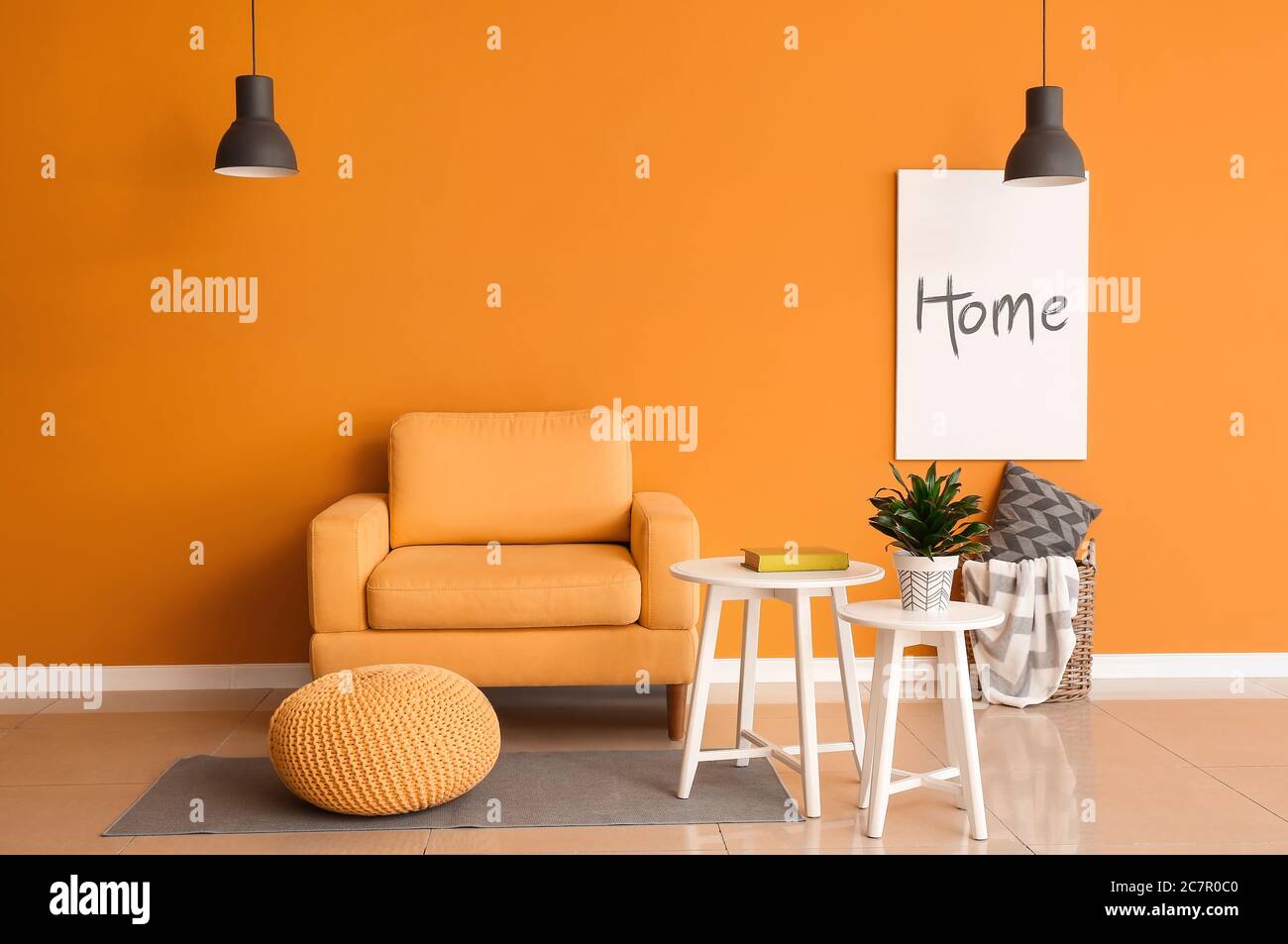 Interior of modern room with tables and armchair Stock Photo - Alamy
