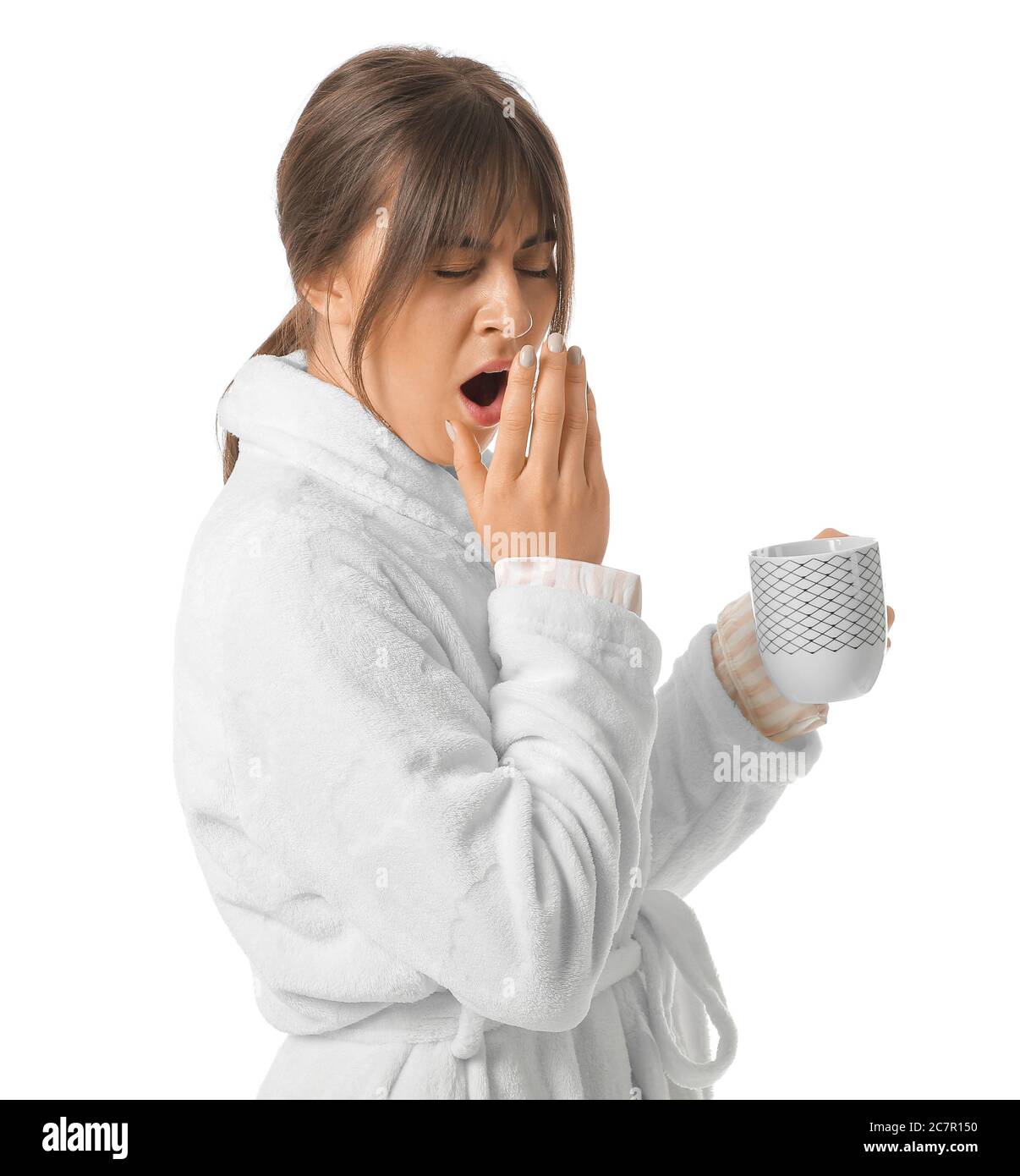Tired woman with cup of tea on white background. Concept of sleep ...