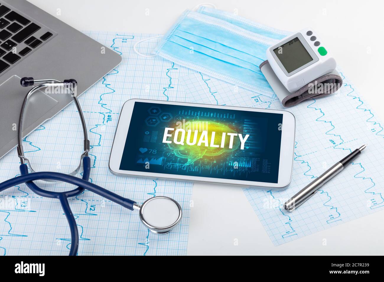 Tablet pc and medical tools with EQUALITY inscription, social ...