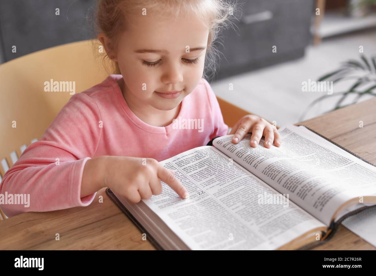 Little girl reading Bible at home Stock Photo - Alamy Little girl reading Bible at home Stock Photo - Alamy