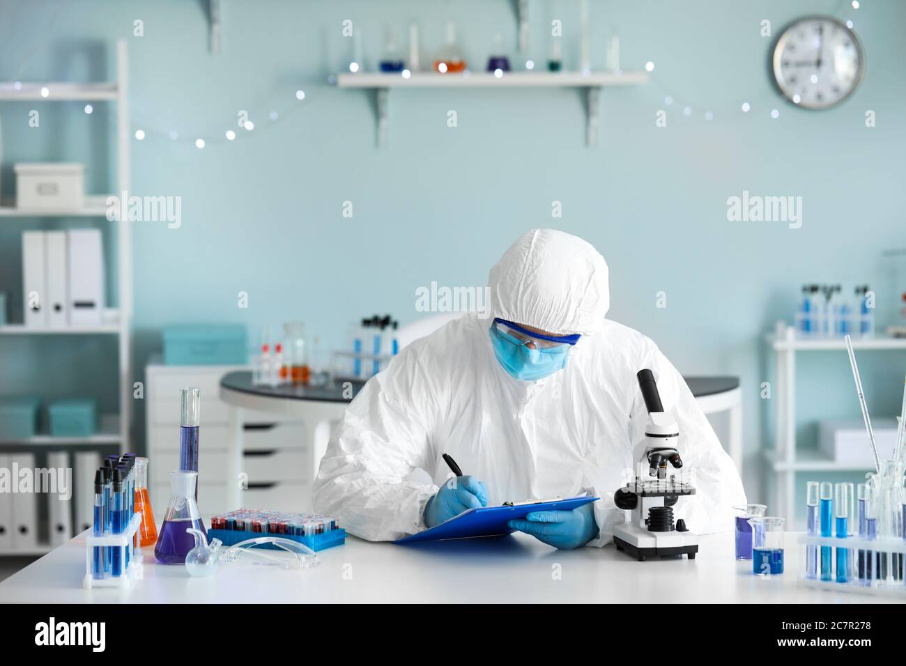 Scientist working with sample in laboratory Stock Photo - Alamy