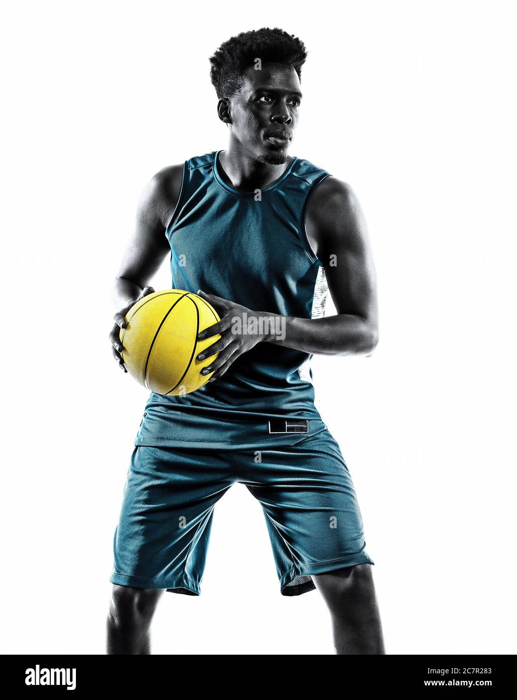 one african basketball player young man in studio isolated on white ...