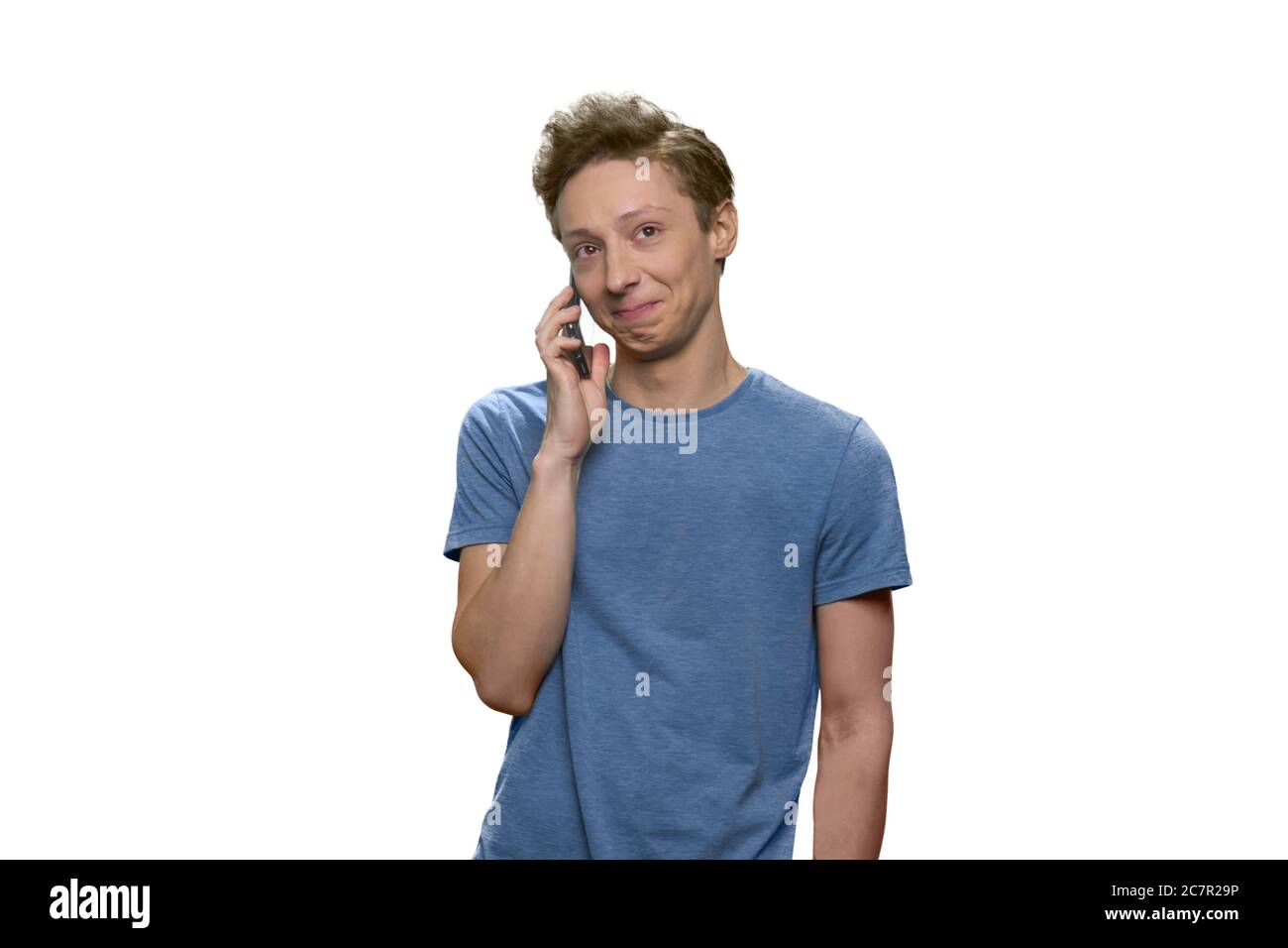 Portrait of teenage boy's making phone call Stock Photo - Alamy
