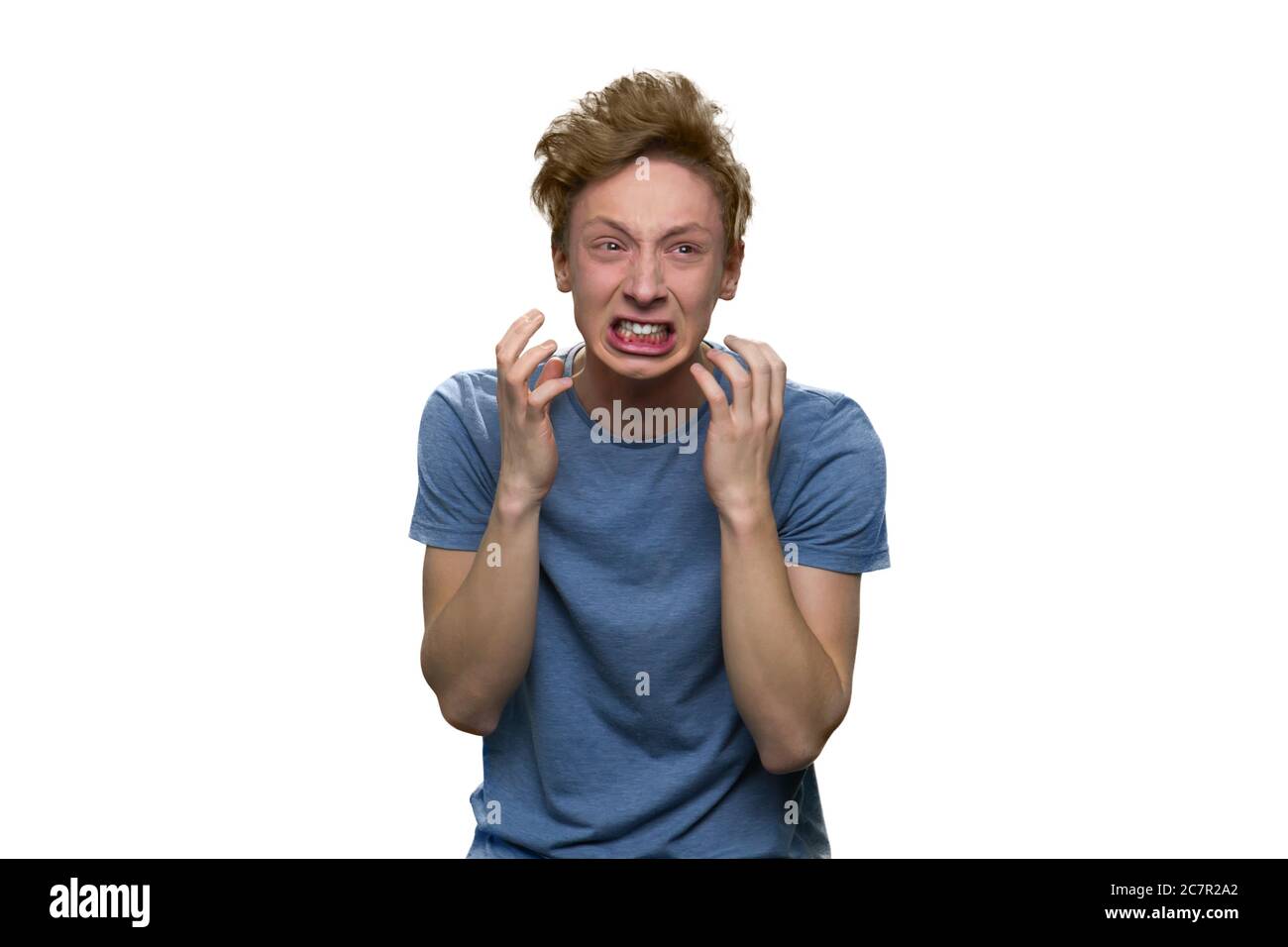 Rage of teenage boy isolated on white Stock Photo - Alamy