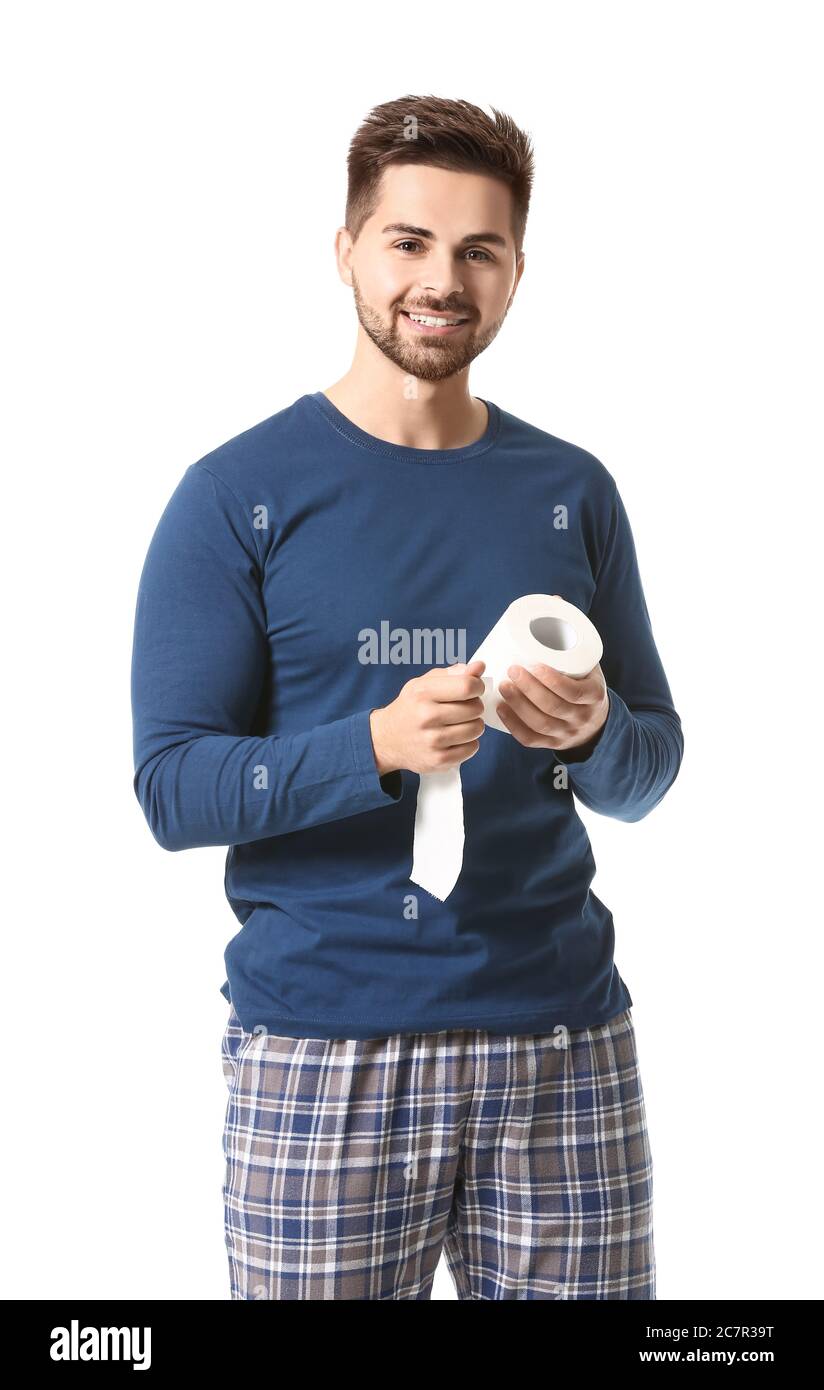 Young man with toilet paper on white background Stock Photo - Alamy
