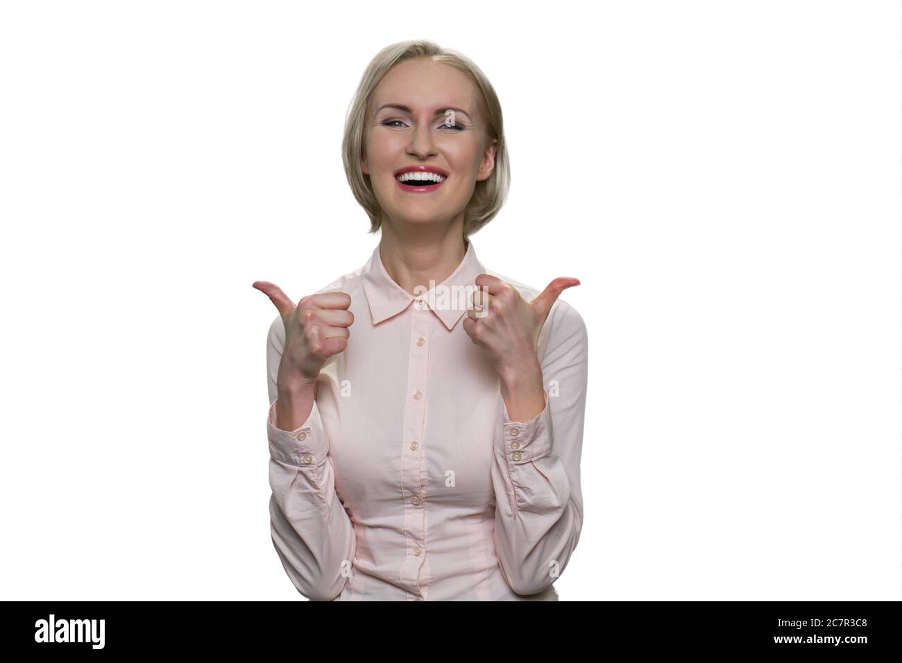 Happy smiling woman with sign ok on white background Stock Photo - Alamy