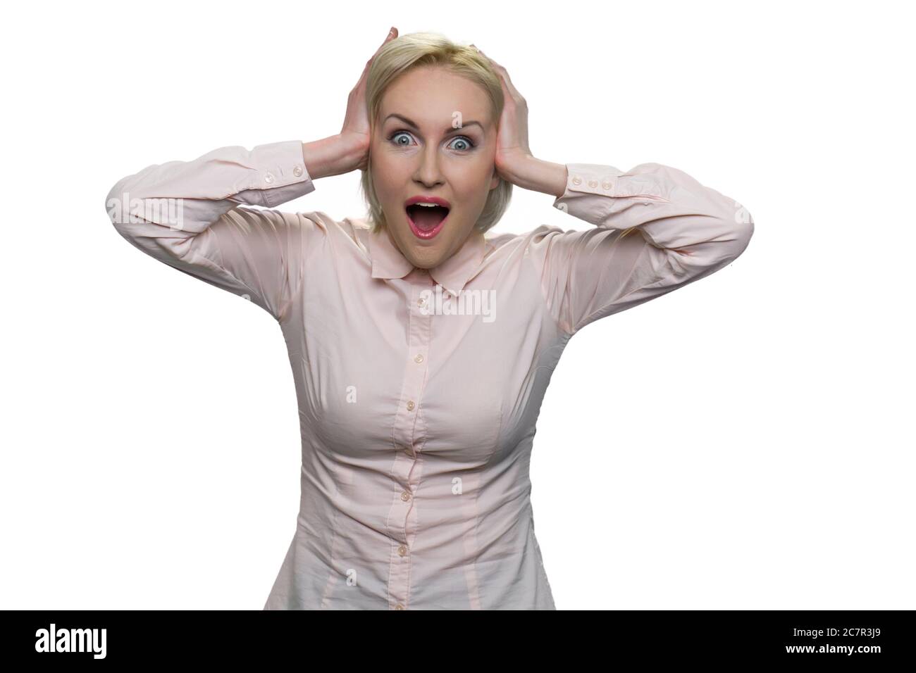 Surprised stunned emotional woman with hands on her head Stock Photo ...