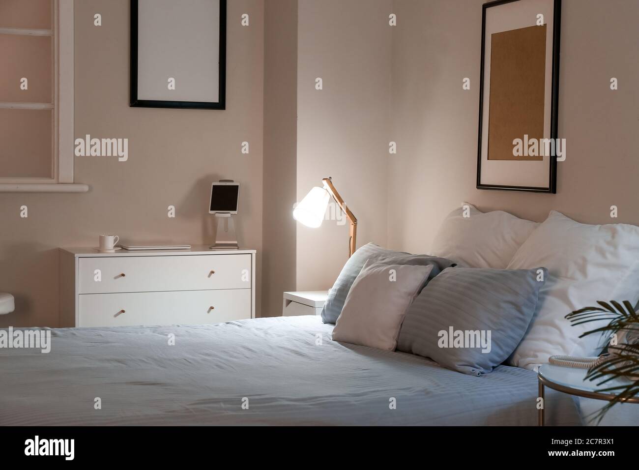 Interior of modern hotel room in evening Stock Photo - Alamy