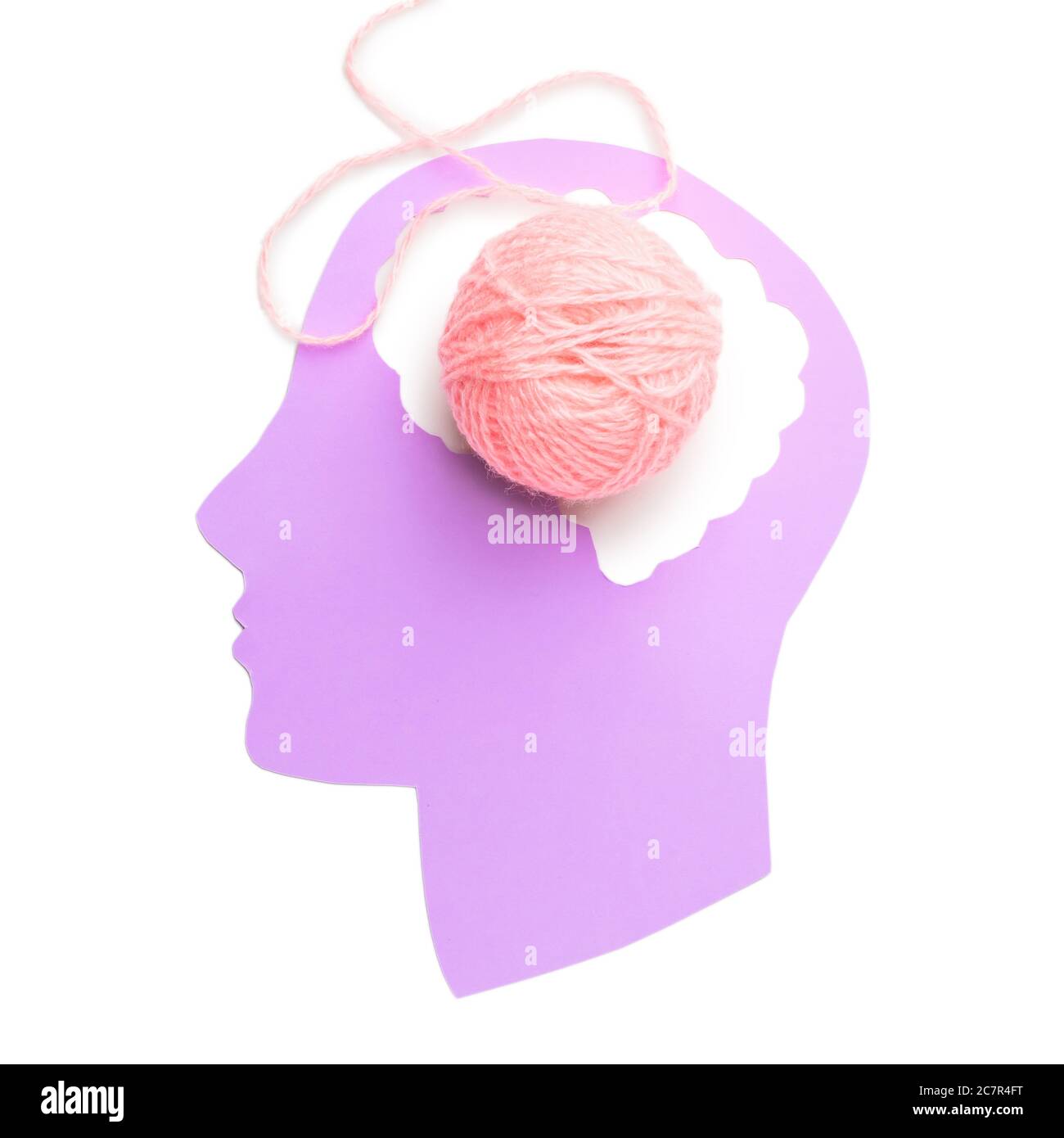 Paper human head and thread on white background. Neurology concept ...