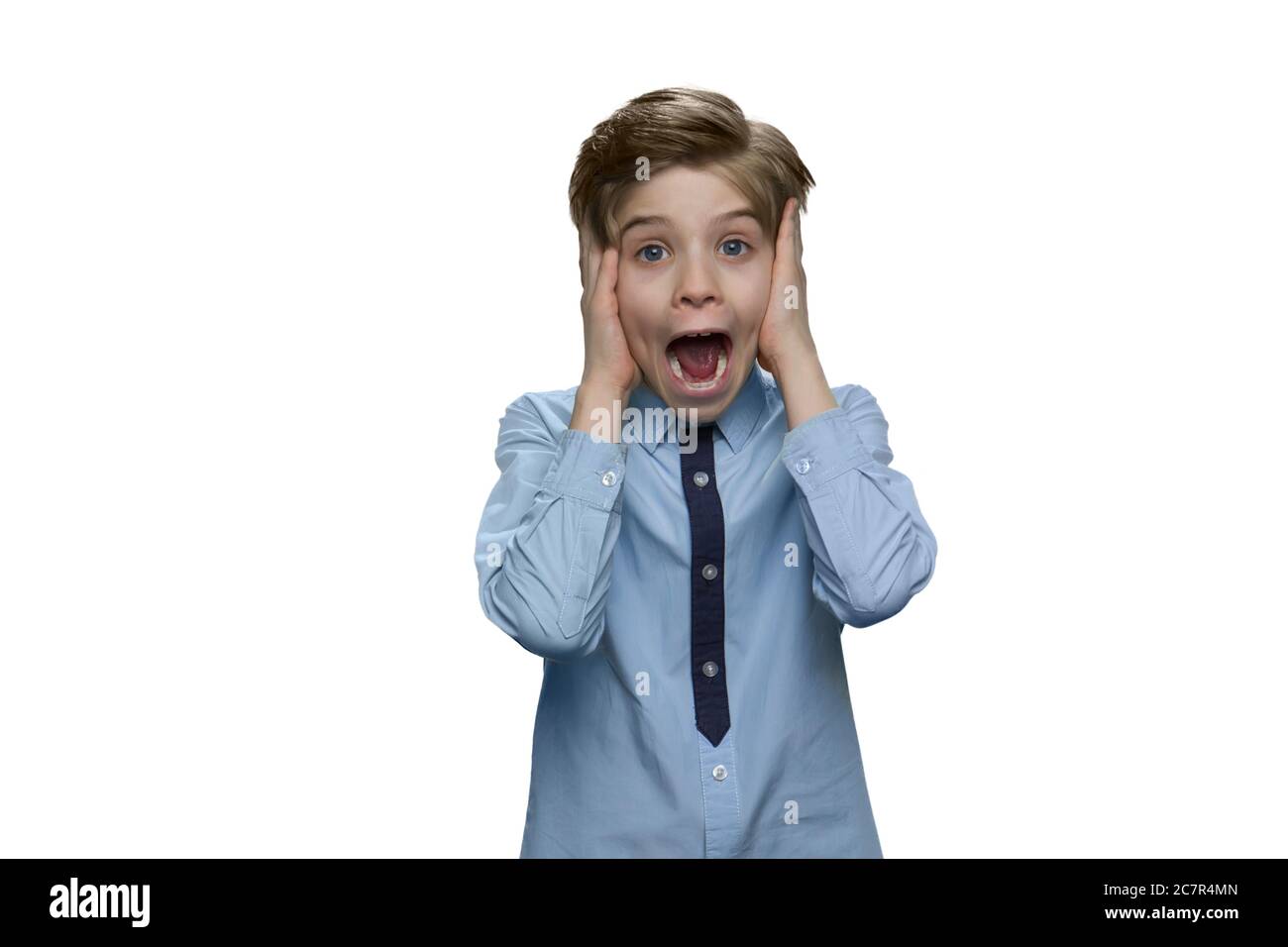 Emotional surprised boy standing with open mouth Stock Photo - Alamy
