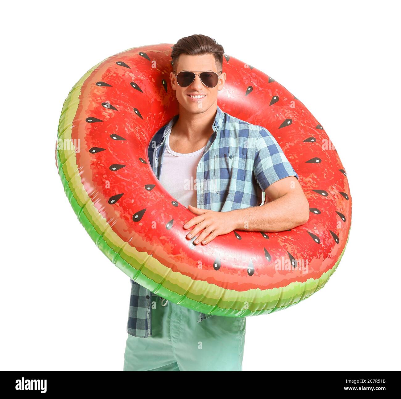 Young man with inflatable ring on white background Stock Photo - Alamy