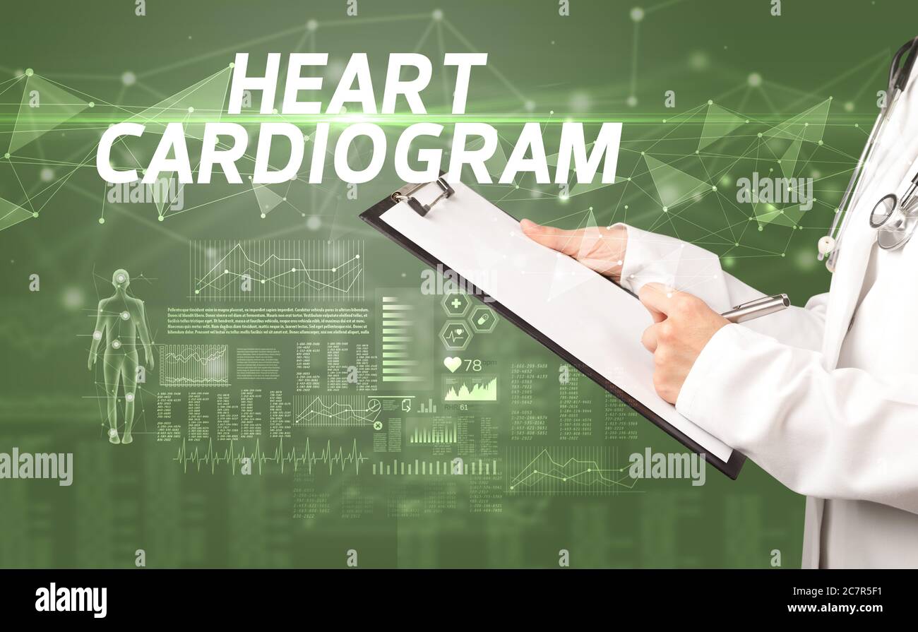 doctor writes notes on the clipboard with HEART CARDIOGRAM inscription ...