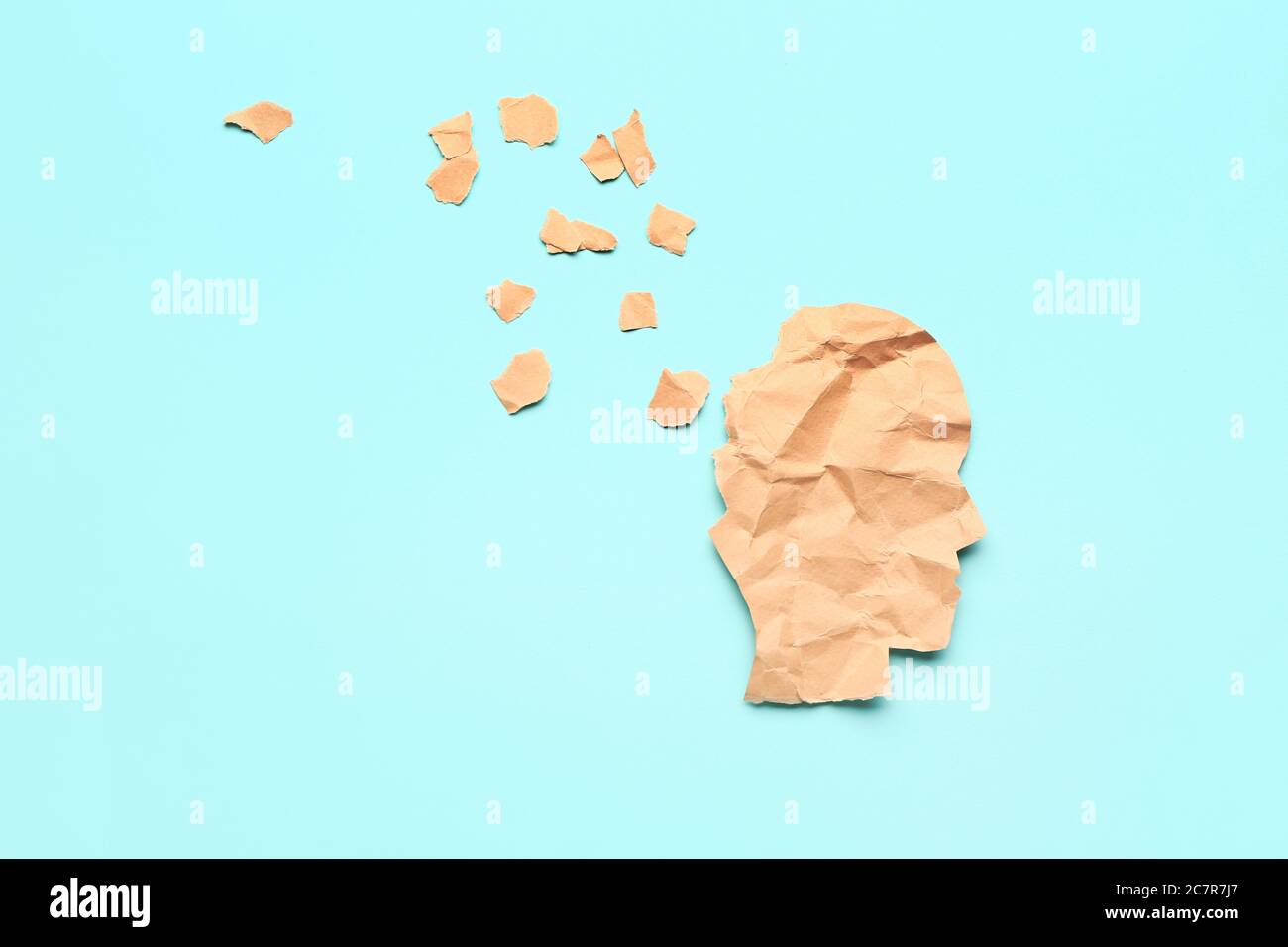 Torn paper human head on color background. Concept of dementia Stock ...