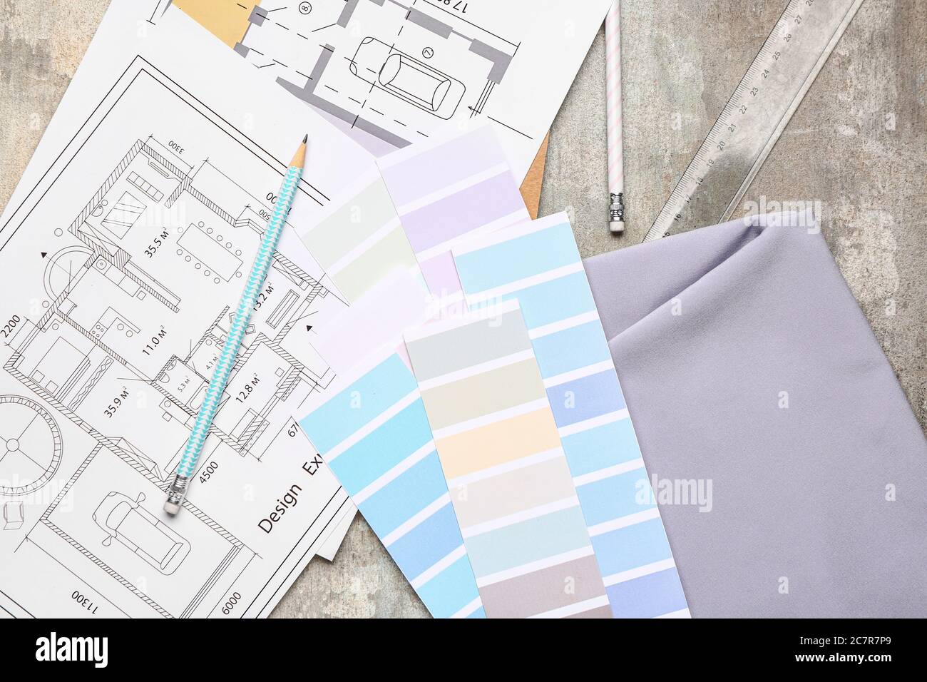 Color palettes with building plans on grey background Stock Photo - Alamy