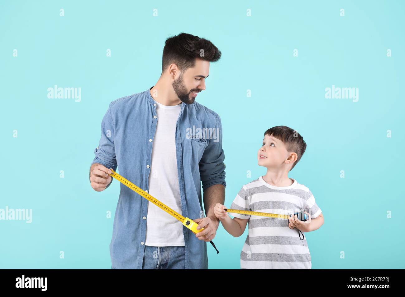 Child using tape measure hi-res stock photography and images - Alamy